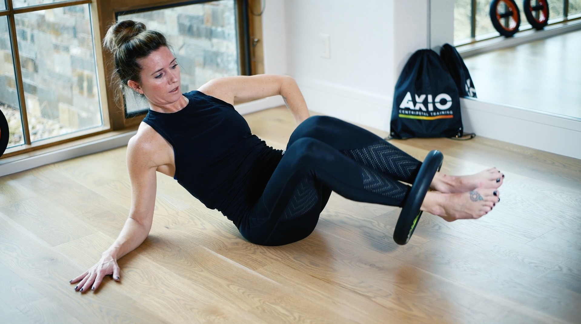 Supine Hip Twist – Supine Core Flow – AXIO Centripetal Training